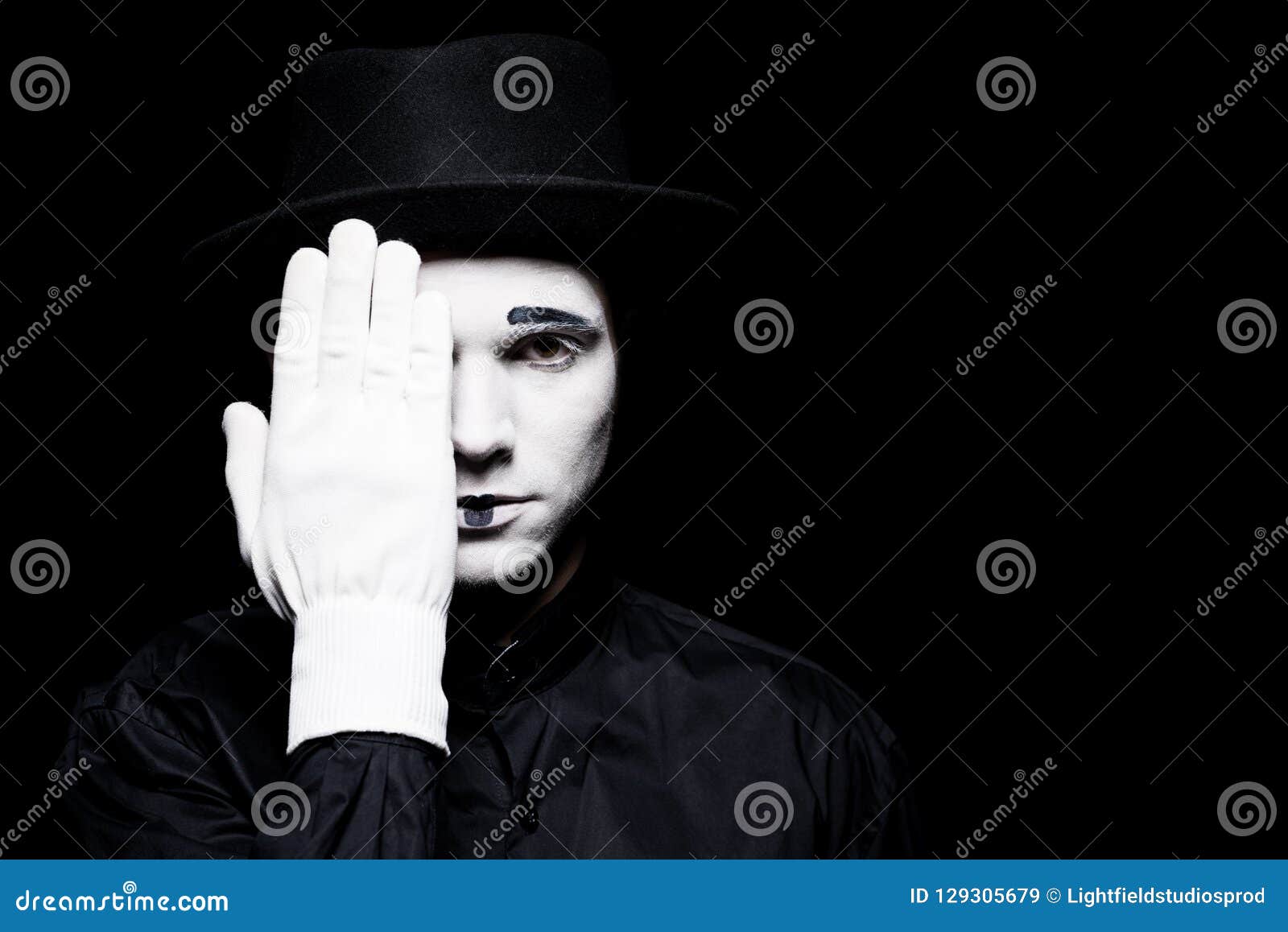 Mime Covering Eye and Looking at Camera Stock Image - Image of mimic ...