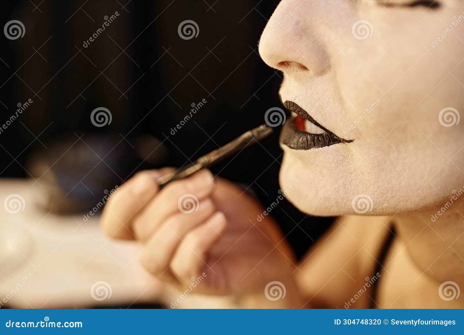 Mime Doing Makeup Backstage and Painting Black Lips Stock Photo - Image ...