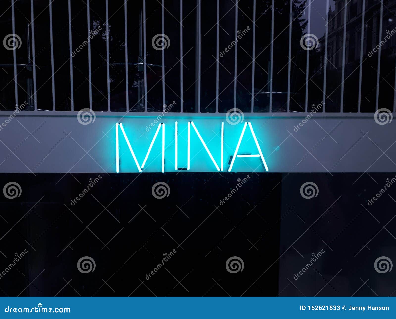 Mina Sign in Neon Shop Window Stock Image - Image of window, shop ...