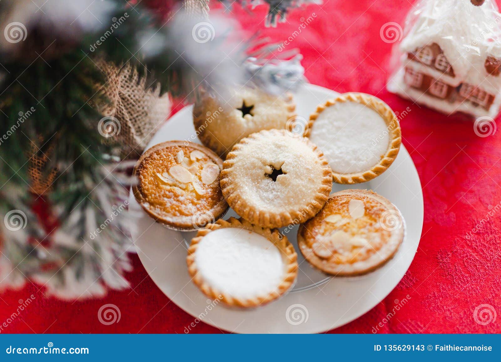 Mince Pies on Christmas Table Setting with Decorations and Tree Stock ...