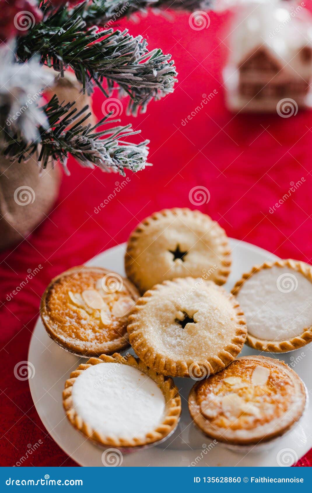 Mince Pies on Christmas Table Setting with Decorations and Tree Stock ...