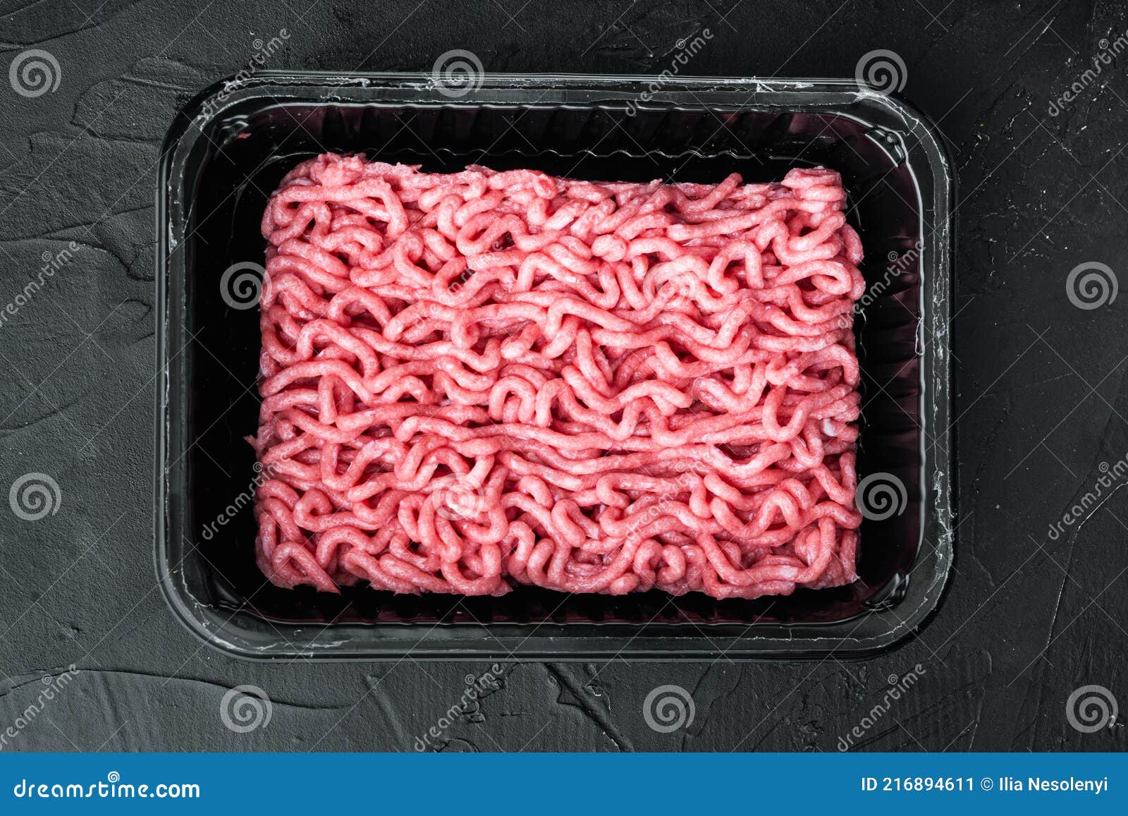 Minced Meat in Packaging, on Black Stone Background, Top View, Flat Lay ...