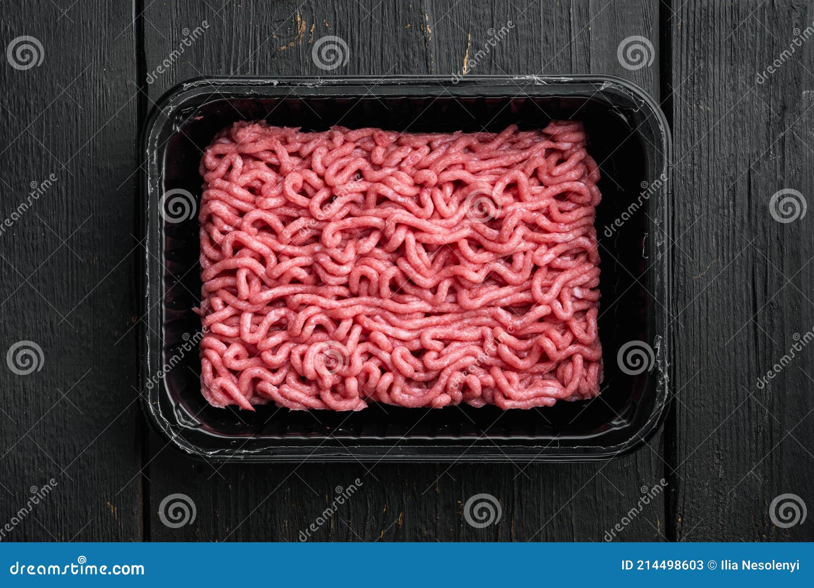 Minced Meat in Packaging, on Black Wooden Table Background, Top View ...