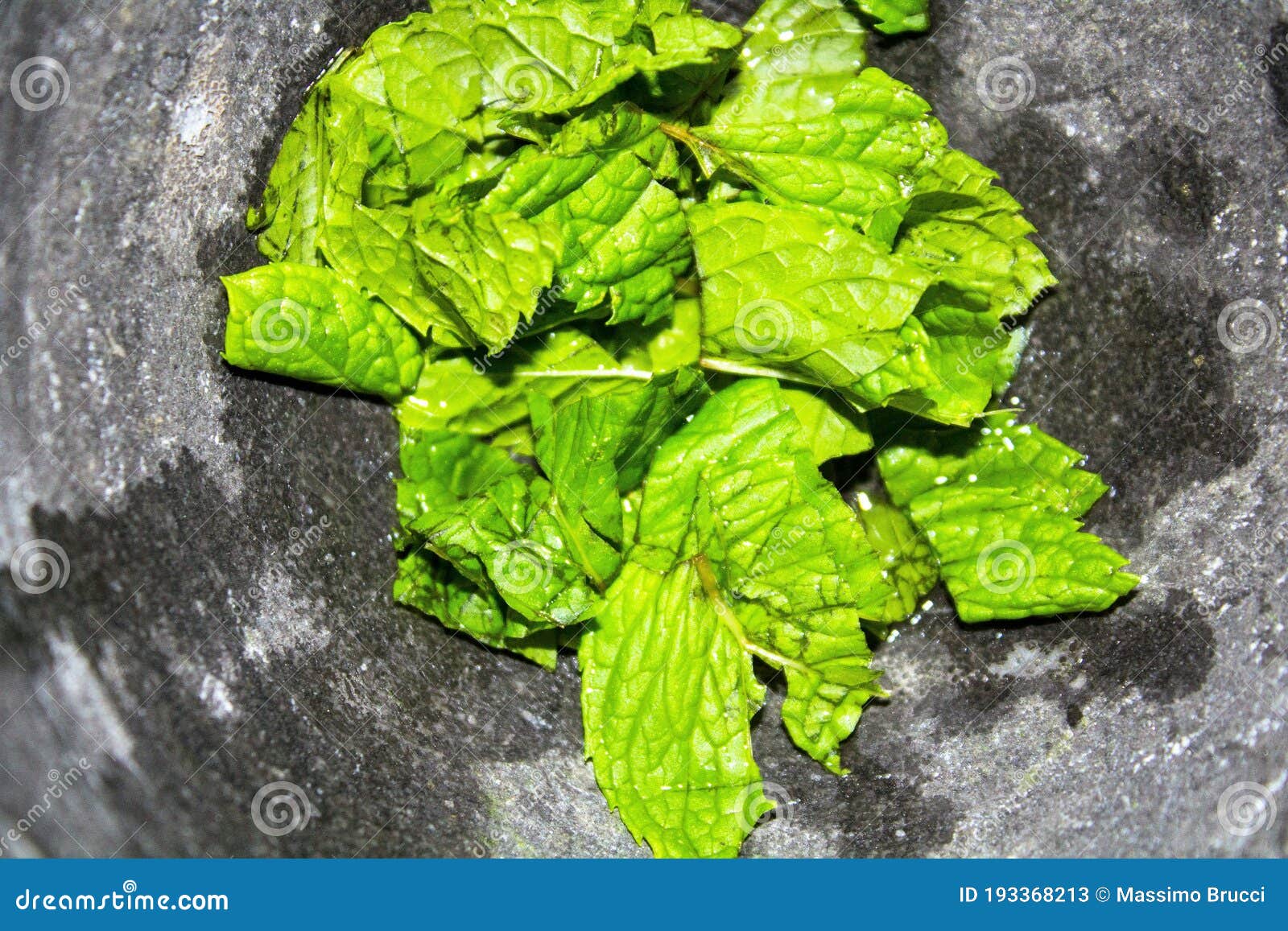 Minced Mint Leaves and Placed in a Kitchen Mortar Ready for Mojito ...