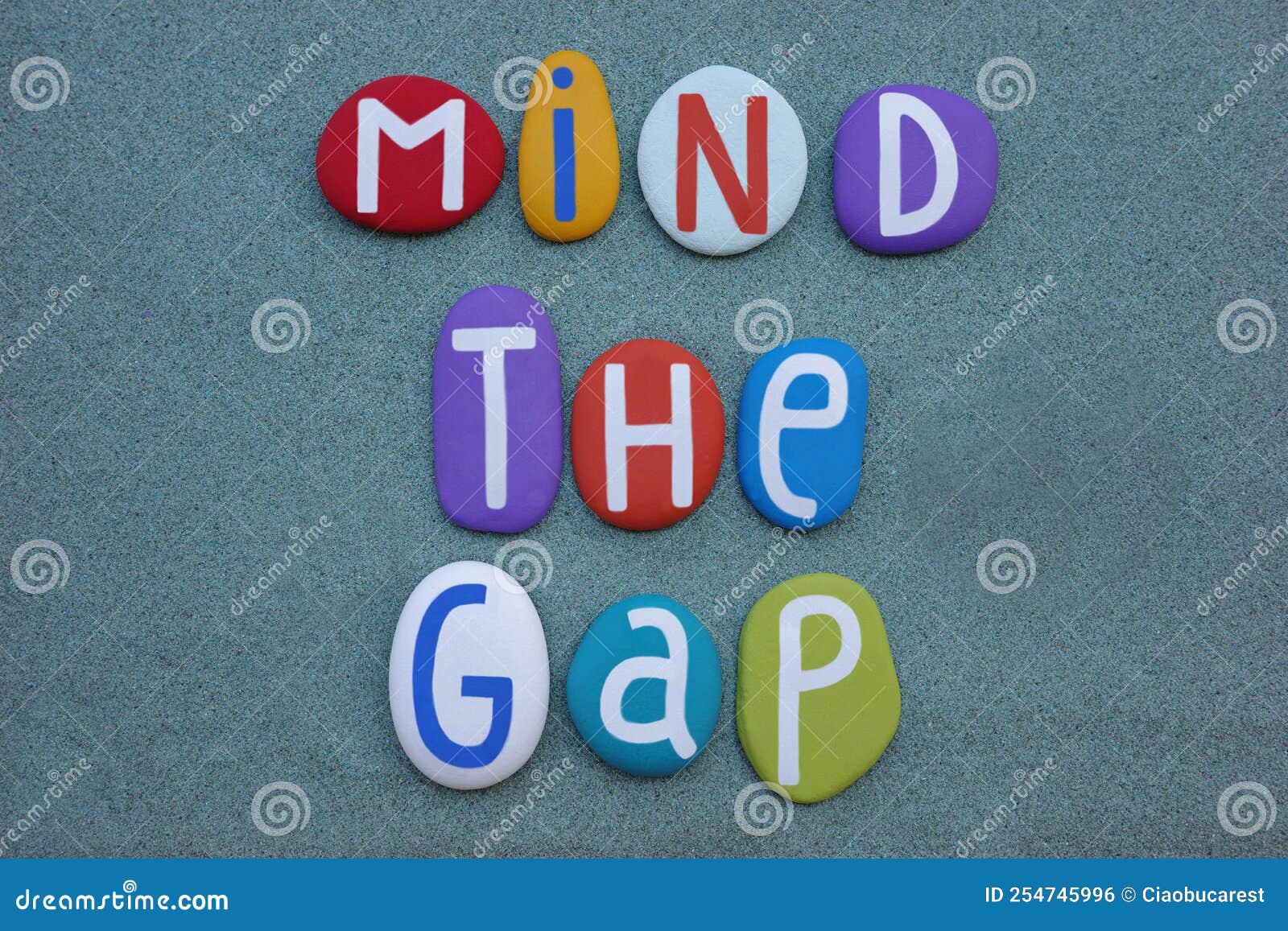 Mind the Gap, Creative Logo Composed with Multi Colored Stone Letters ...