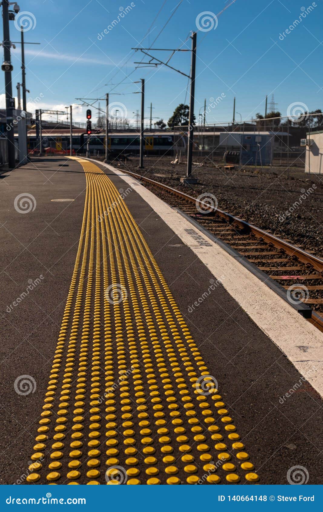 The Mind Gap Warning on a Platform at a Train Station, with Yellow ...