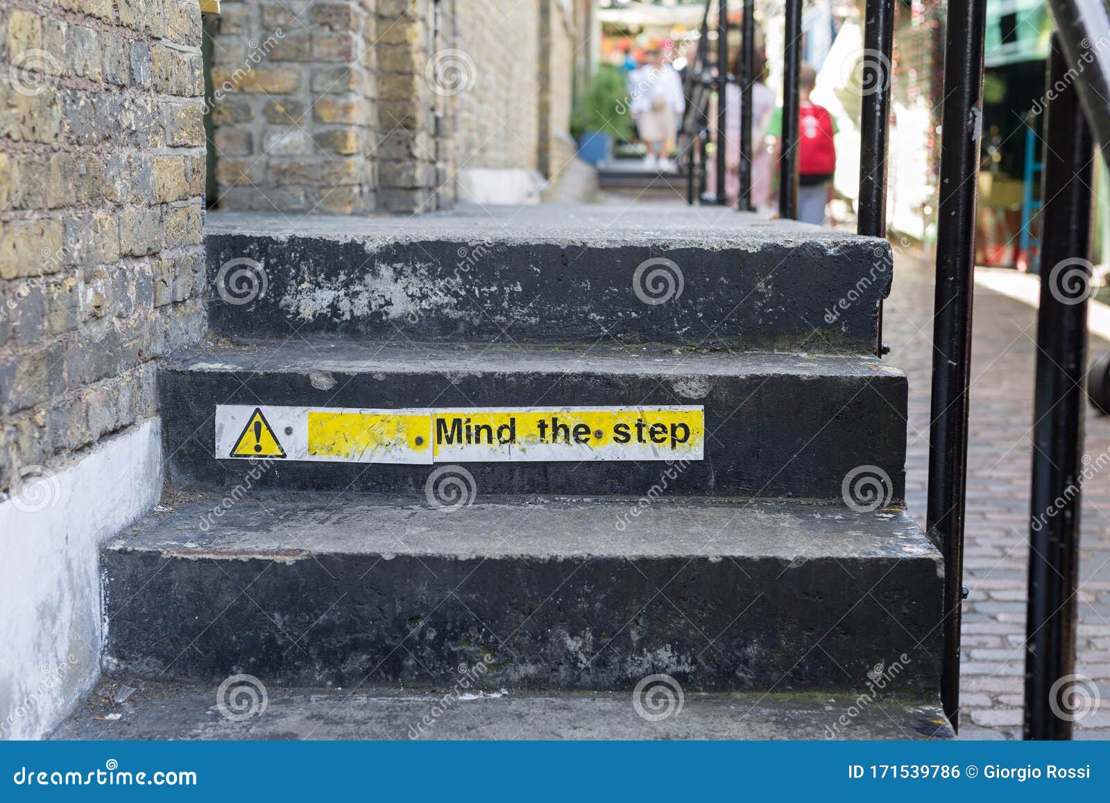 Mind The Step Sign On Worn And Black Steps Stock Photography ...