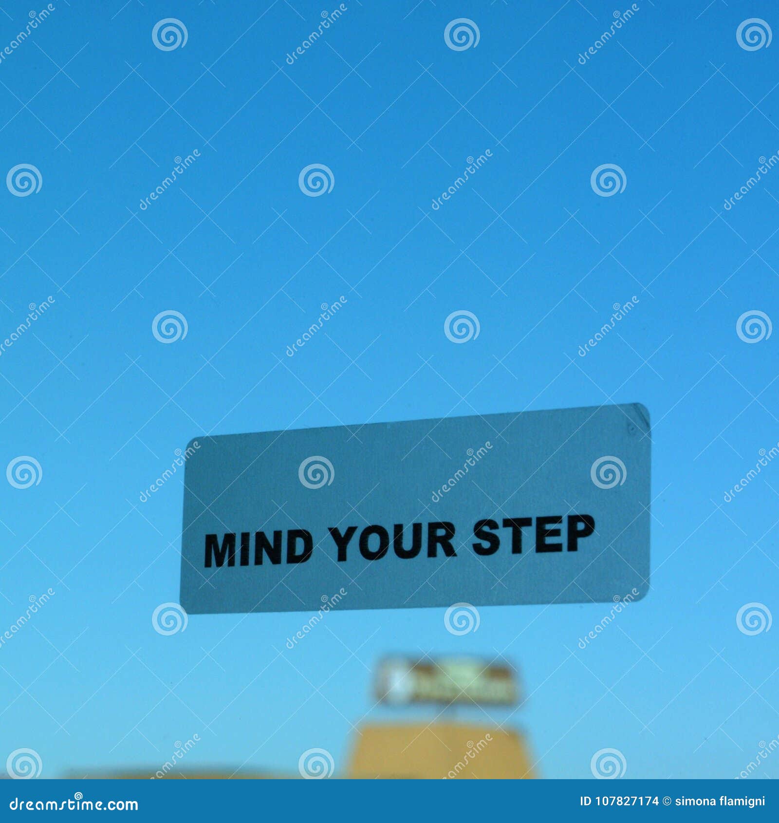 Mind Your Step Sign on a Window Stock Photo - Image of sign, style ...