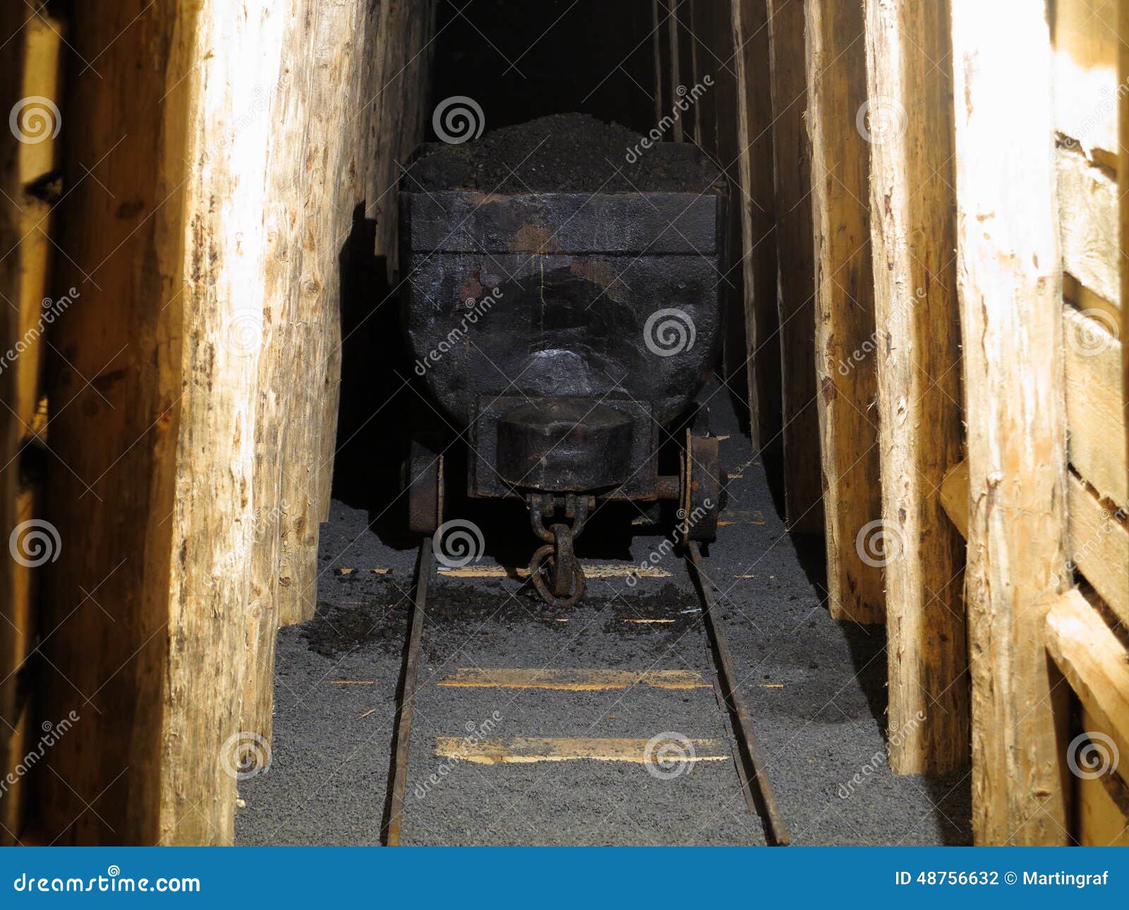 Vintage Cart in Wooden Tunnel at Entrance of Ore Mine Stock Photo ...