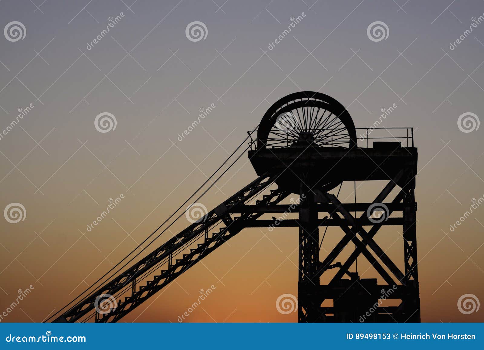 Mine shaft at sunset stock image. Image of shaft, scene - 89498153