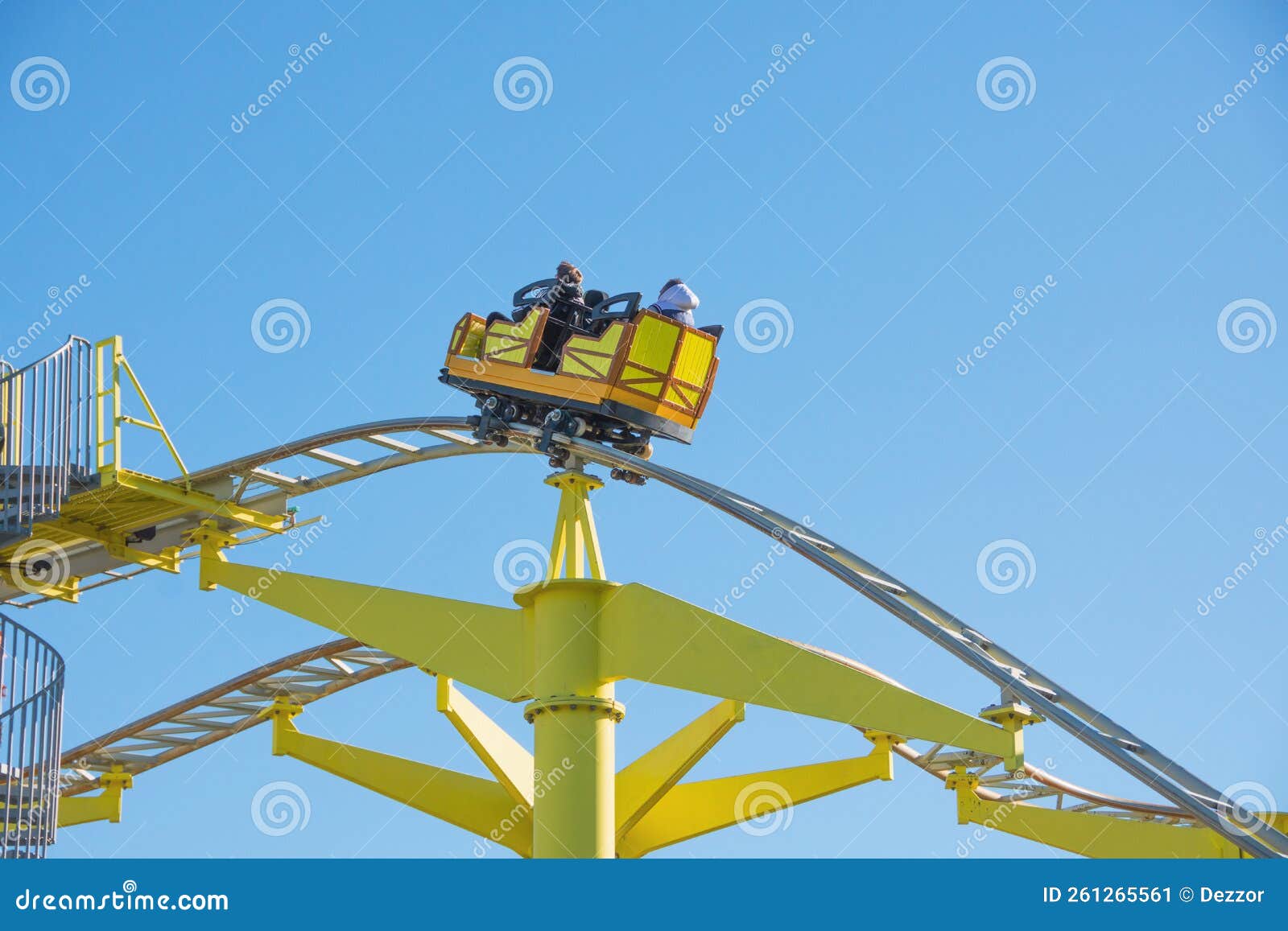 Minecart Goes Up the Yellow Roller Coaster Rails Stock Image - Image of ...