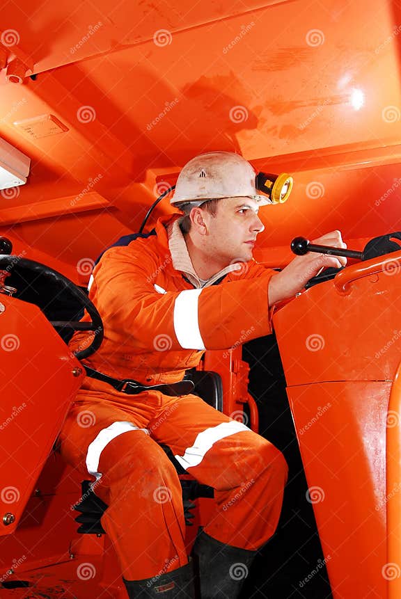 Miner in the cockpit stock image. Image of cave, helmet - 3855251