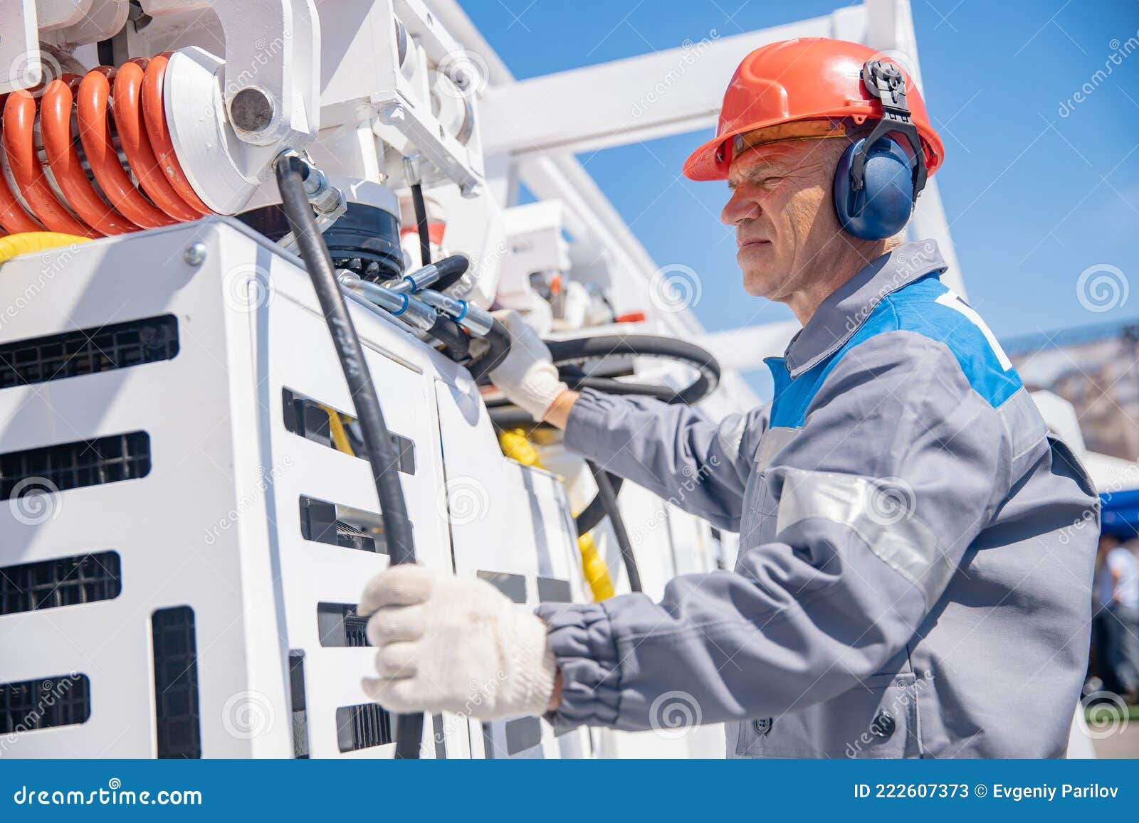 Miner Operator in Helmet Control Drilling Machine in Coal Mine. Concept ...