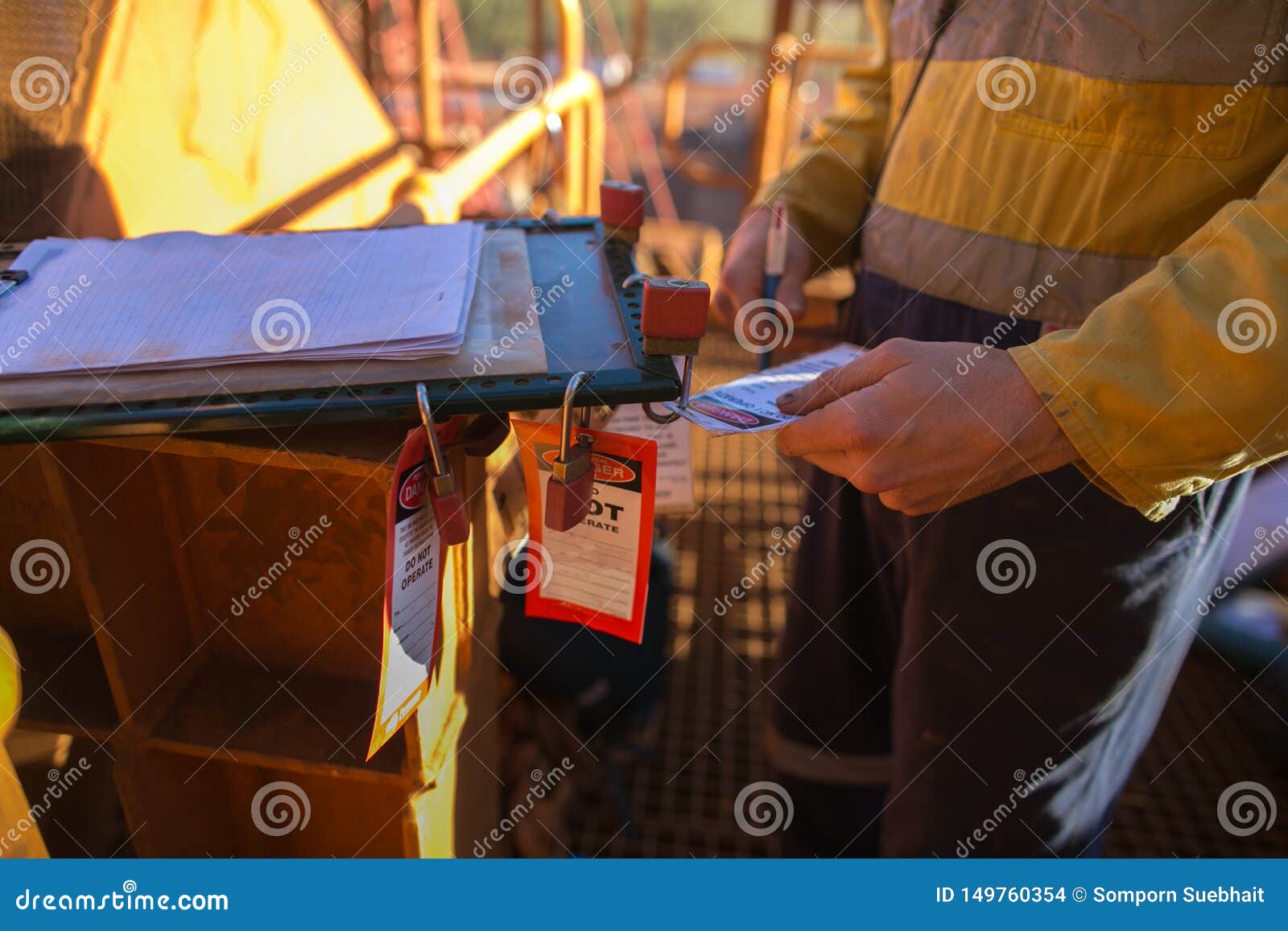 Miner Supervisor Checking Names on the Isolation Permit Lock Box To ...