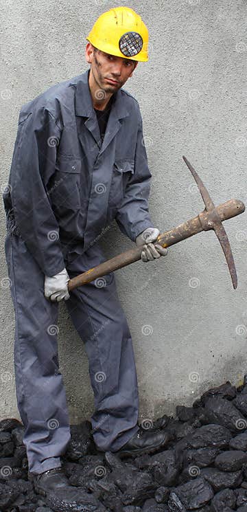 Miner using a pickaxe stock image. Image of ecology, lignite - 57694629