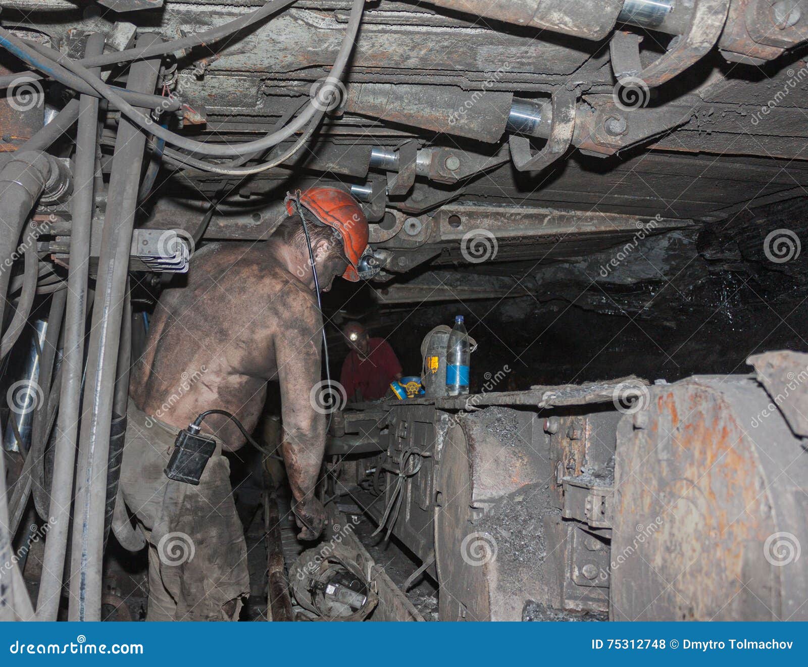 Miners Near a Coal-plow Machine in the Underground Workings Editorial ...