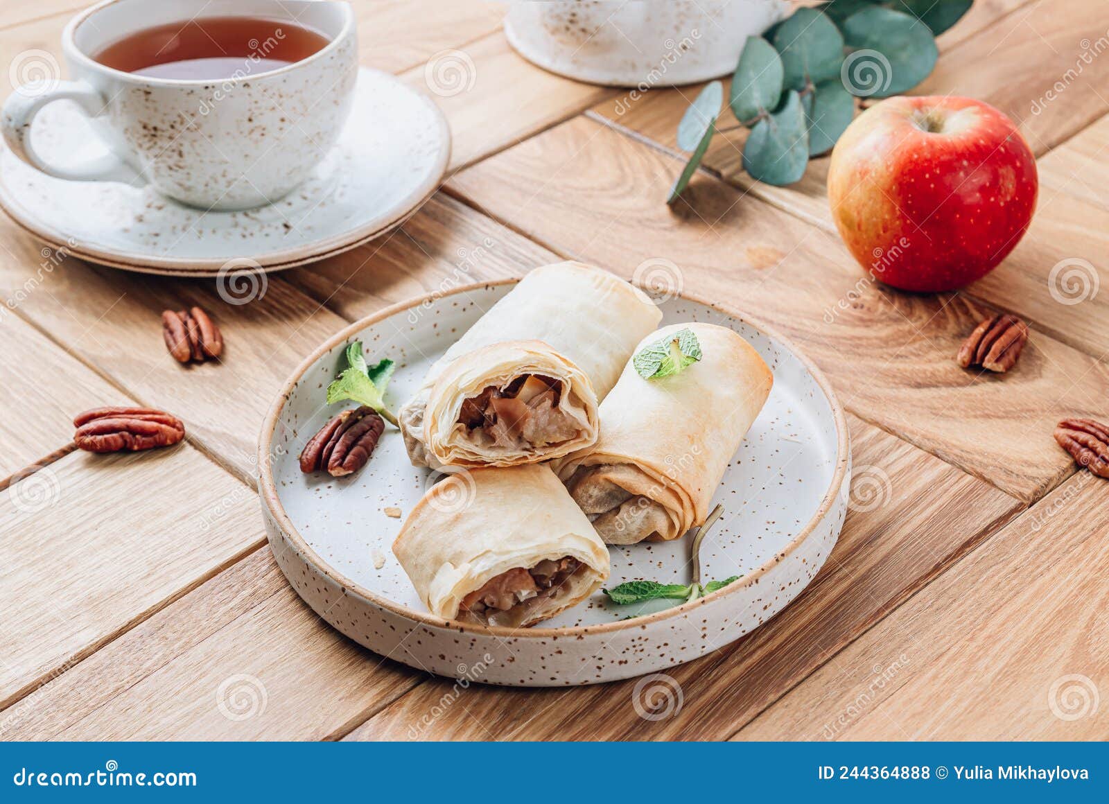 Mini Apple Strudel with Pecans and Mint on Wooden Table. Viennese ...