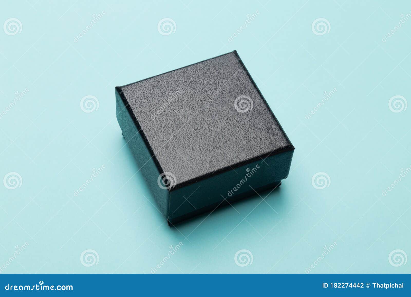 Mini Black Box Product Packaging Isolated on Blue Background. Stock ...