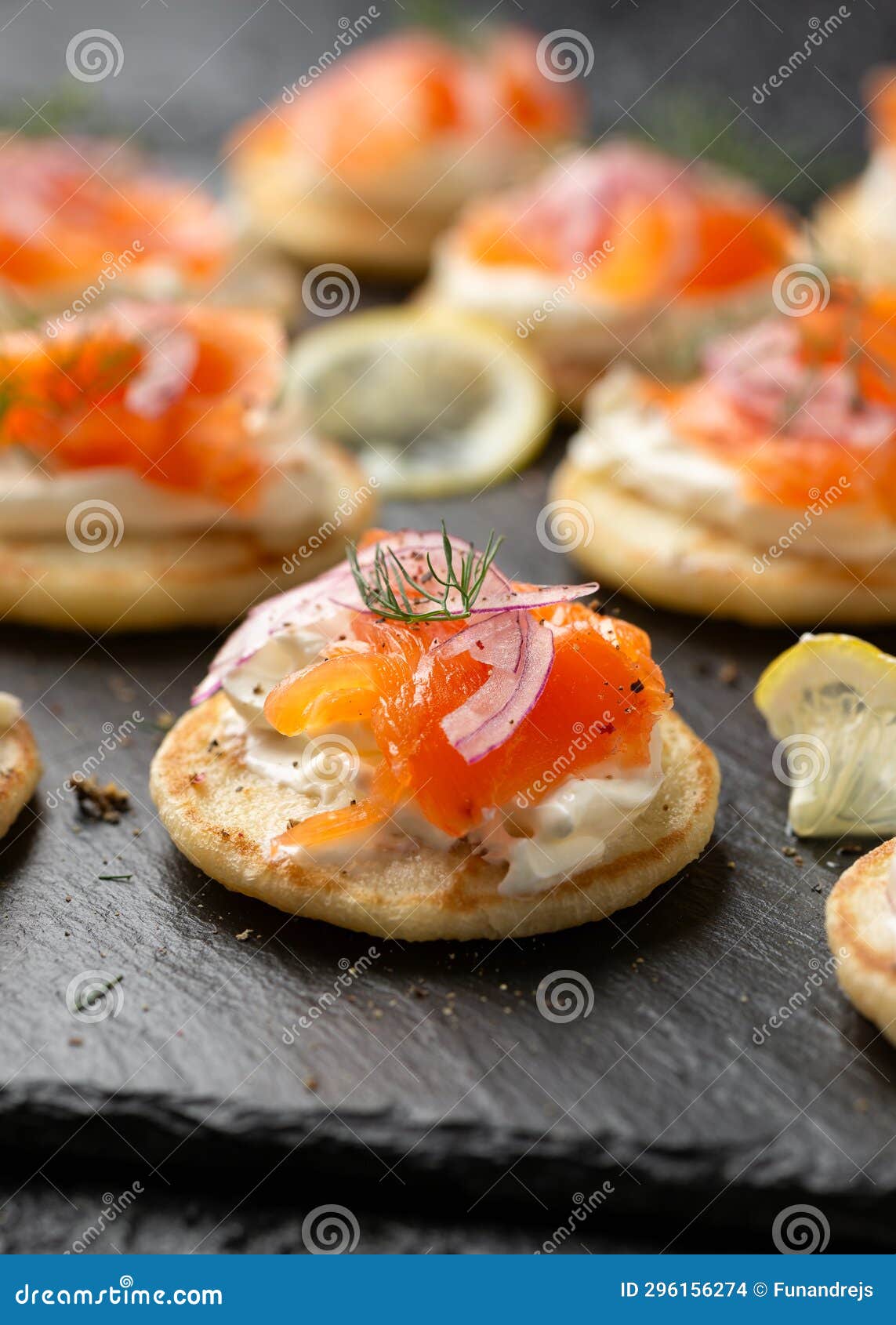 Mini Blini Pancakes with Soft Cheese, Cold Smoked Salmon and Dill Stock ...