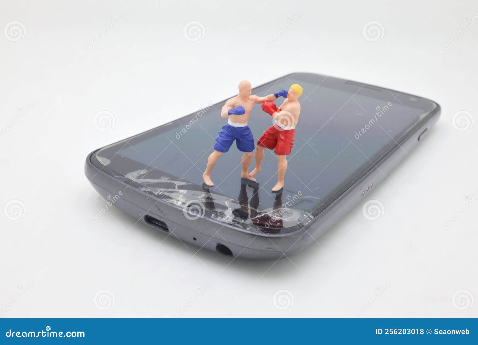 Mini of Boxers in Action on Mobile Phone Stock Photo - Image of young ...