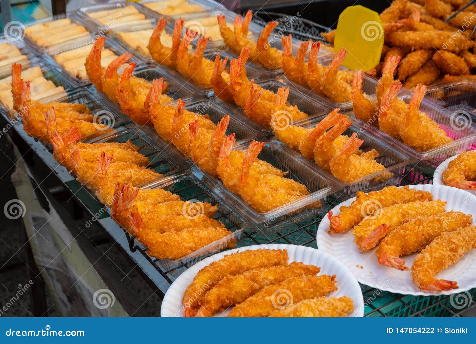 Mini Breaded and Fried Shrimp in Plastic Box Stock Photo - Image of ...