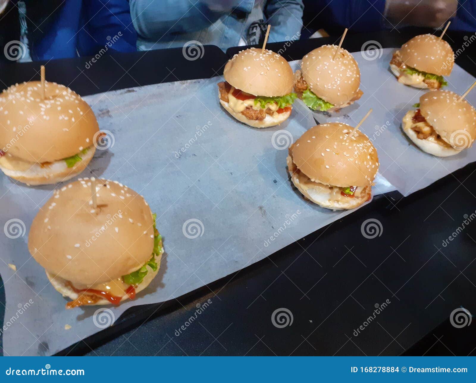 Mini burgers party stock photo. Image of mini, night - 168278884