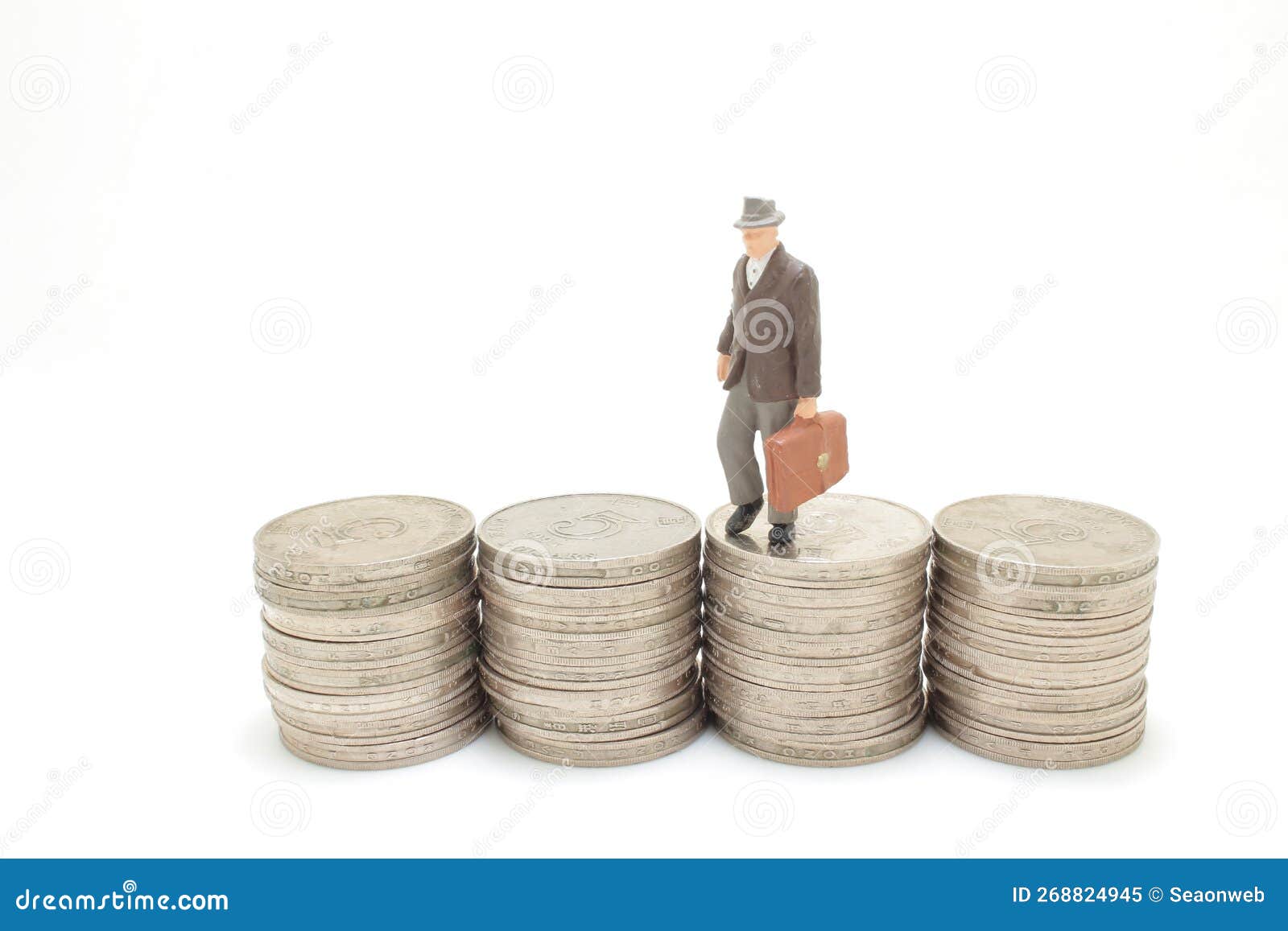 The Mini of Business Figure Walk on the Coins Stock Image - Image of ...