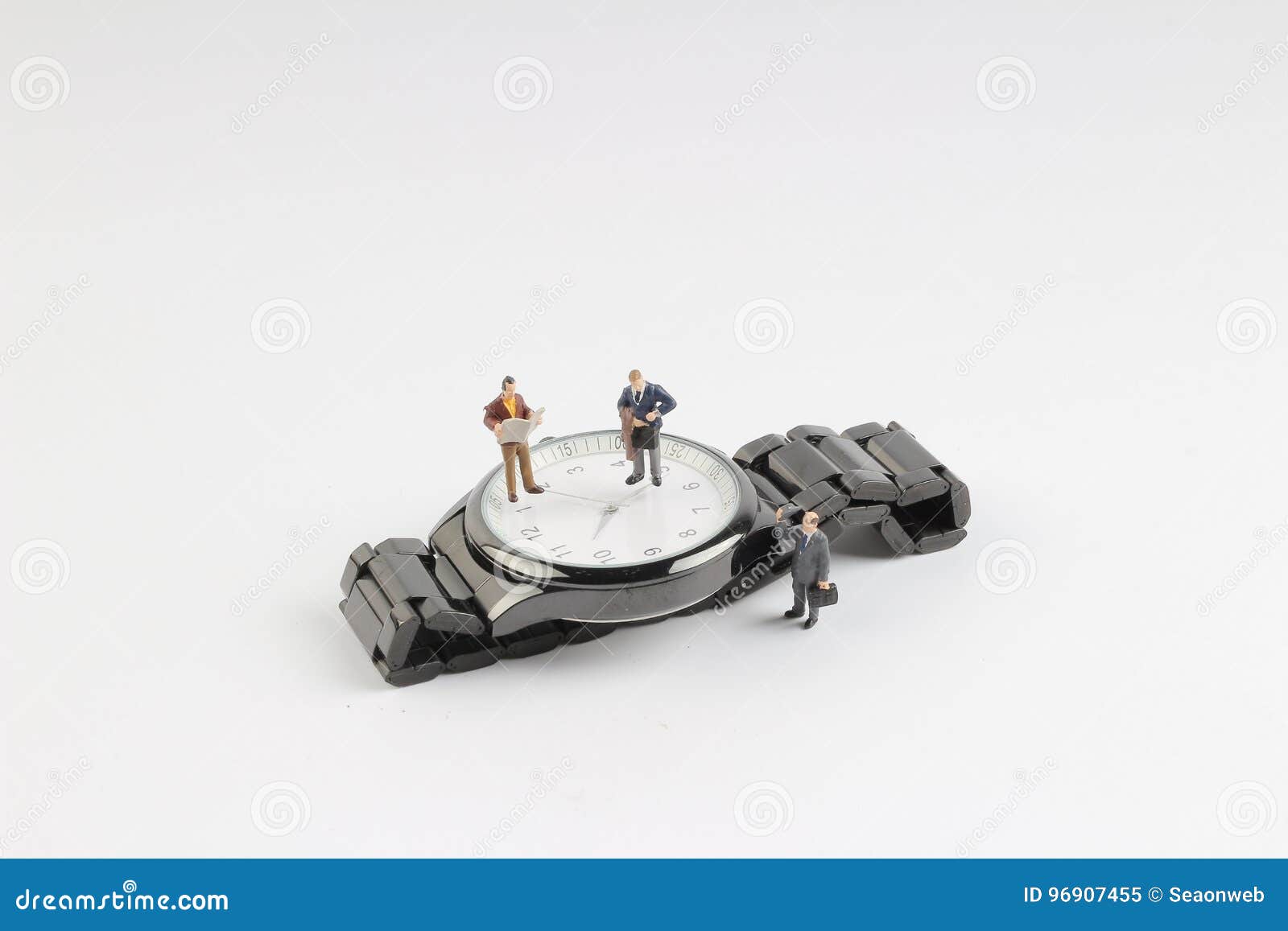 Mini Business Man Figure Standing on Watch Stock Image - Image of ...