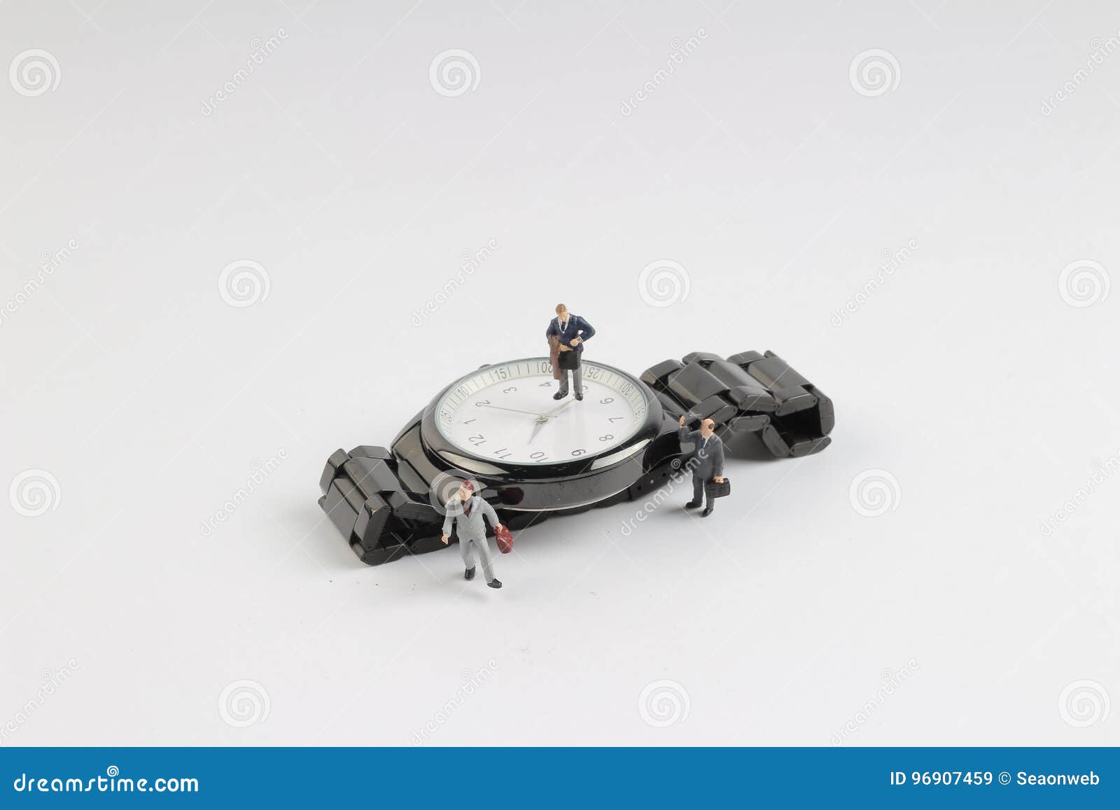 Mini Business Man Figure Standing on Watch Stock Image - Image of ...