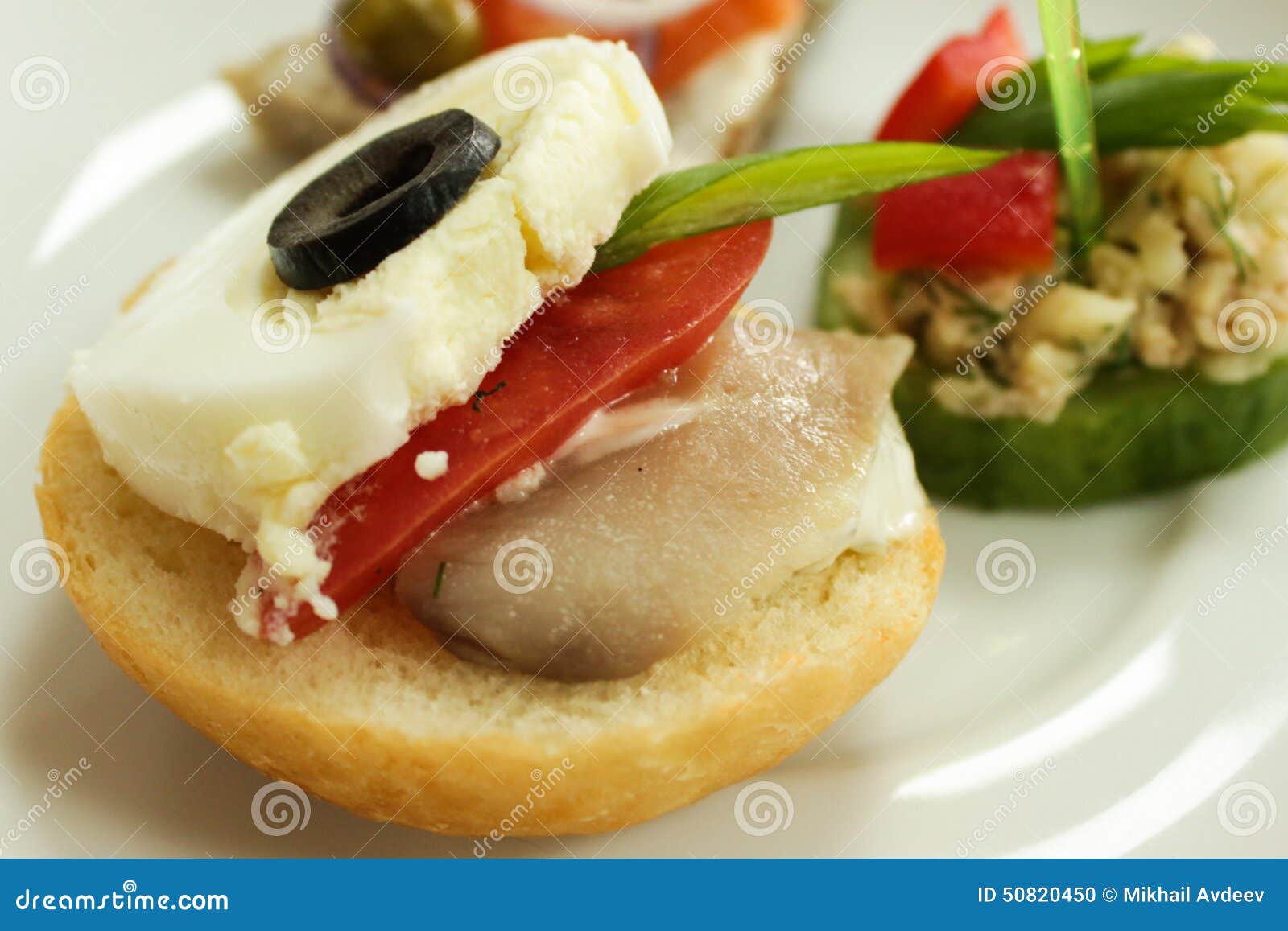 Mini Canapes With Green Avocado Paste, Tomato, Red Pepper, Cream Sauce ...