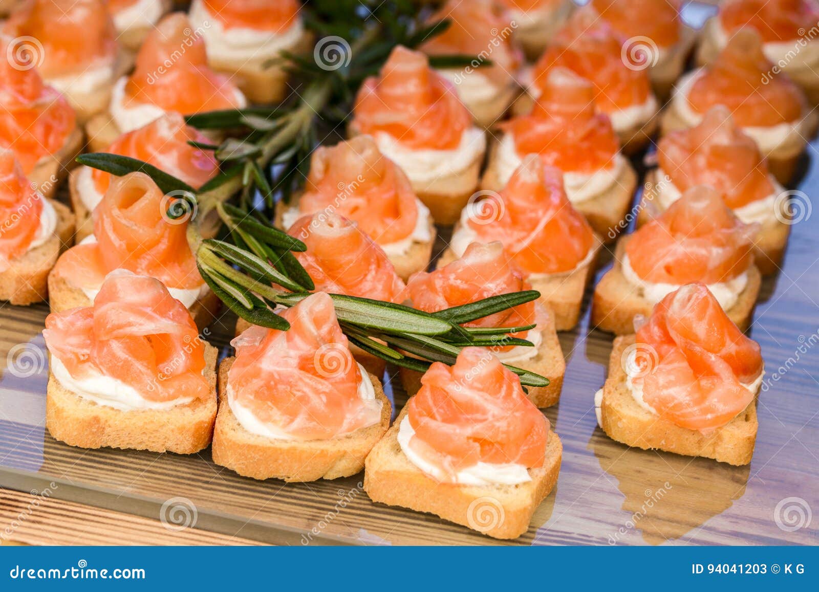 Mini Canapes with Smoked Salmon and Rosemary Sprig. Stock Image - Image ...