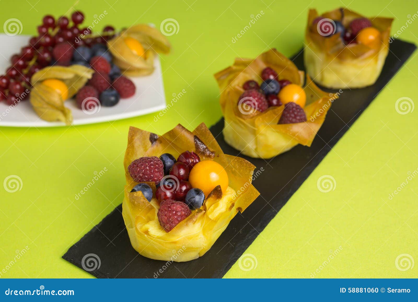 Mini Cheesecakes with Filo Pastry and Berries Stock Photo - Image of ...