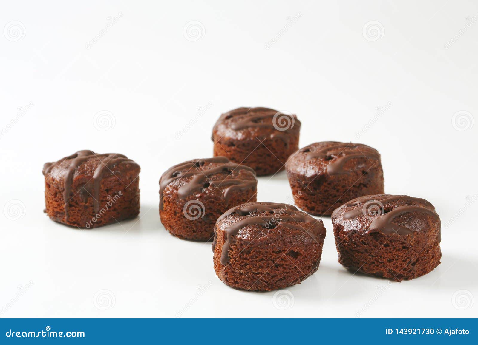 Mini chocolate cakes stock photo. Image of topping, leaves - 143921730