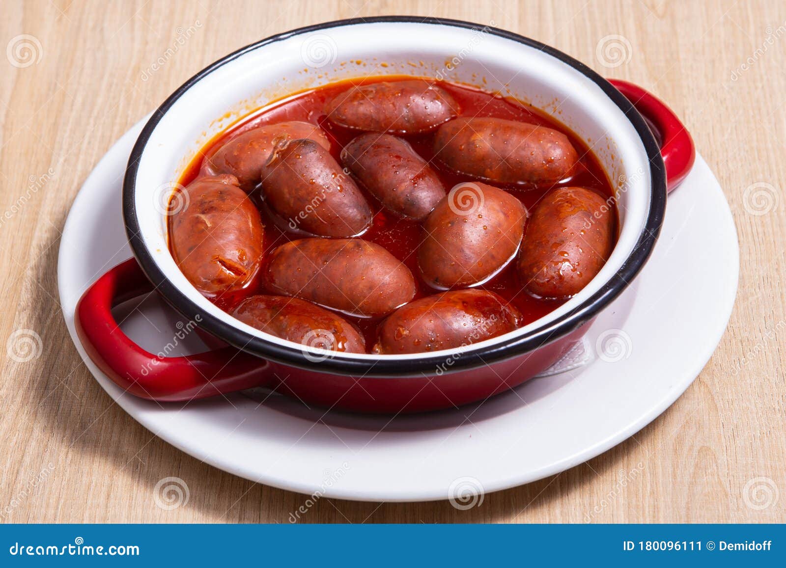Mini chorizos in a pot stock image. Image of bottles - 180096111
