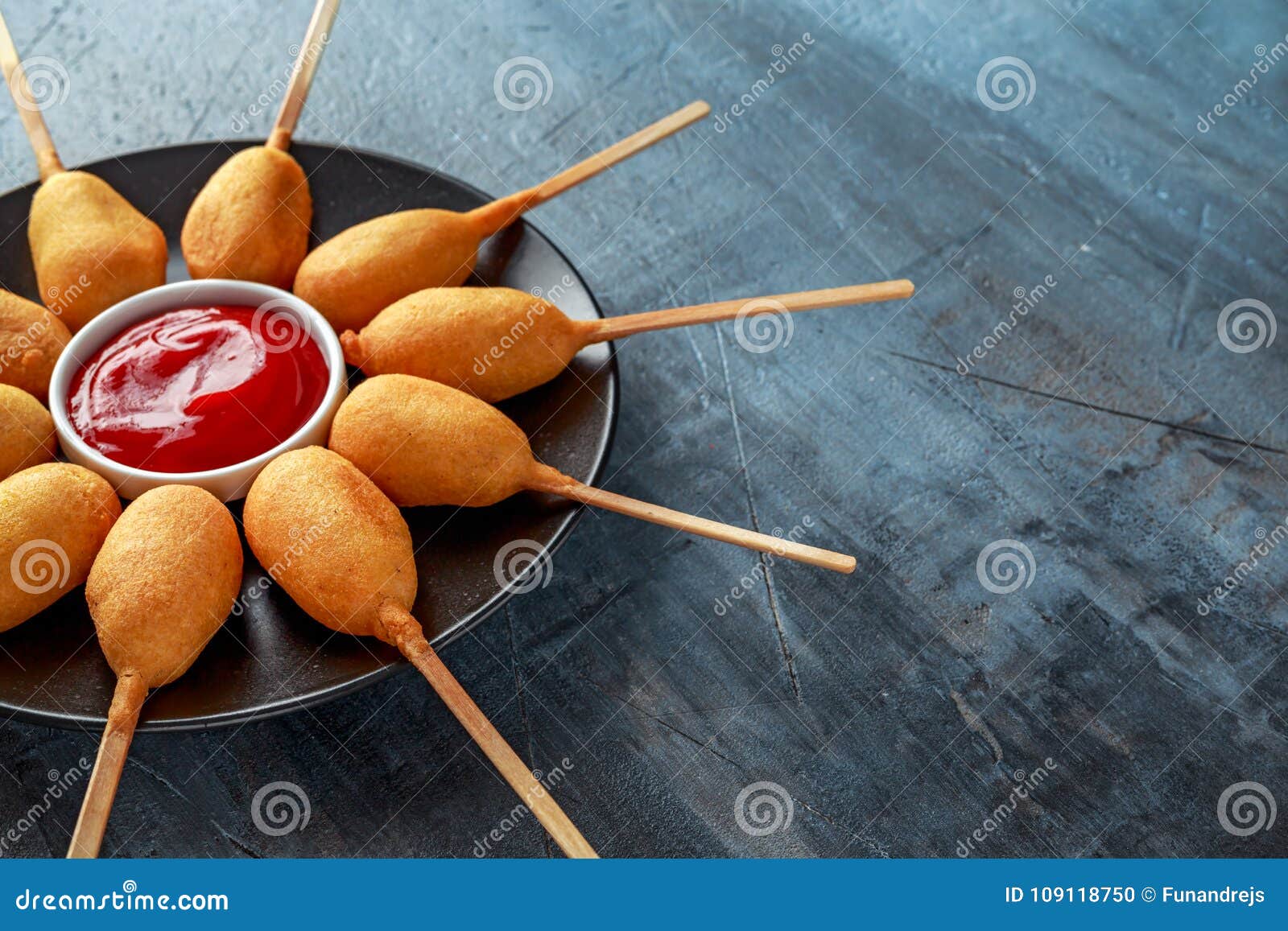 Mini Corn Dogs on Black Plate with Ketchup Stock Photo - Image of ...