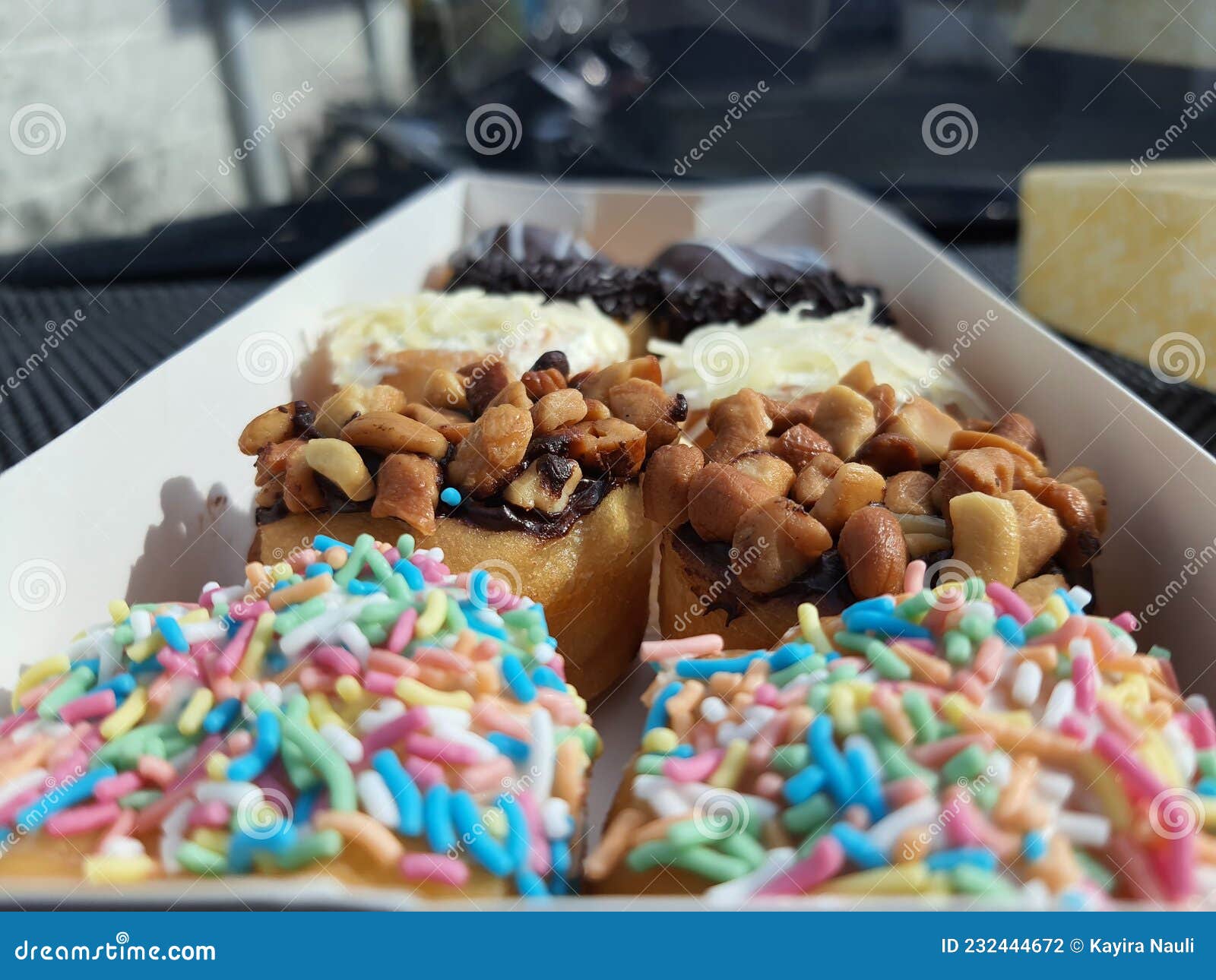 Mini Donuts with Various Toppings, in a White Box Stock Photo - Image ...