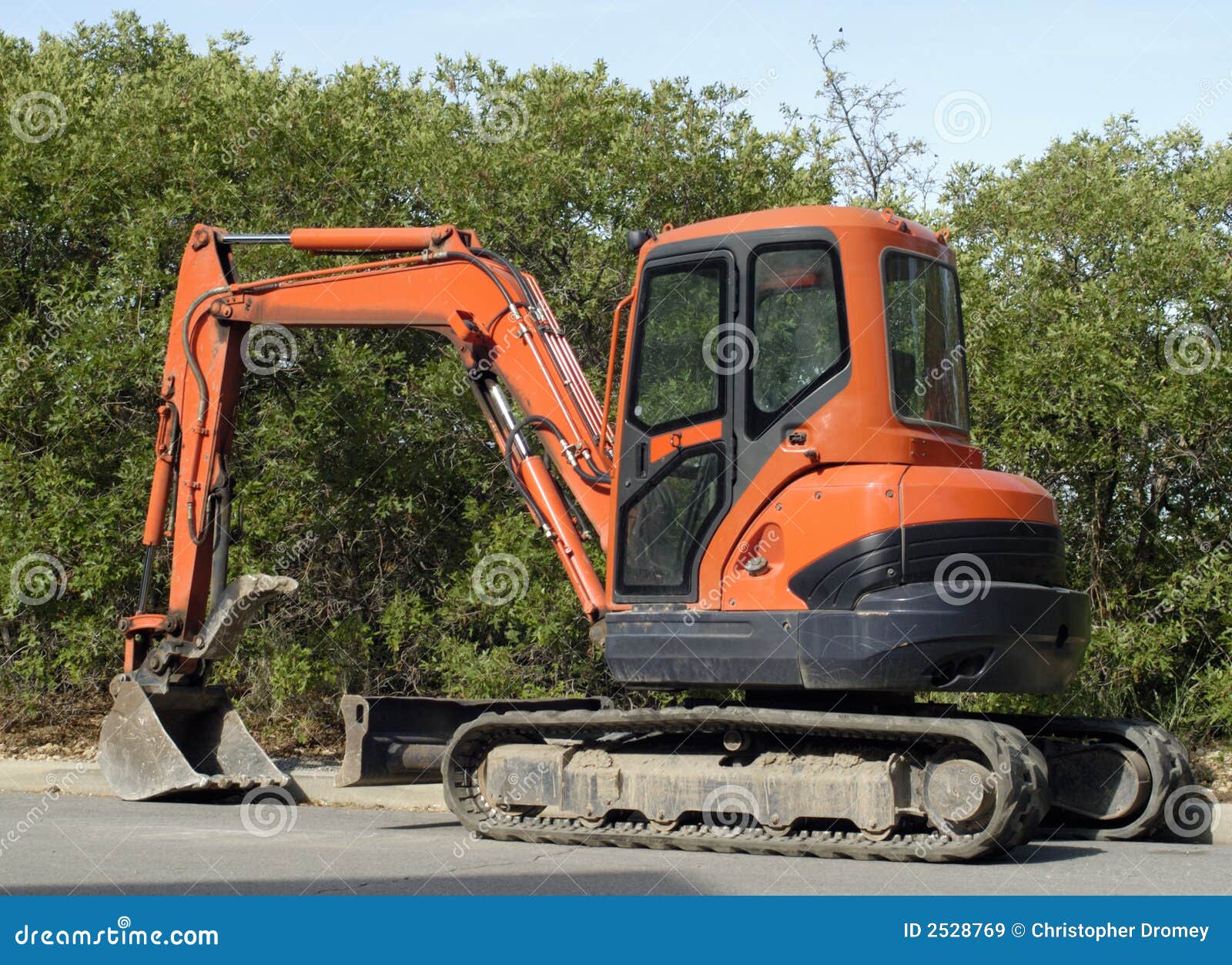 Mini excavator from back stock image. Image of earth, machinery - 2528769