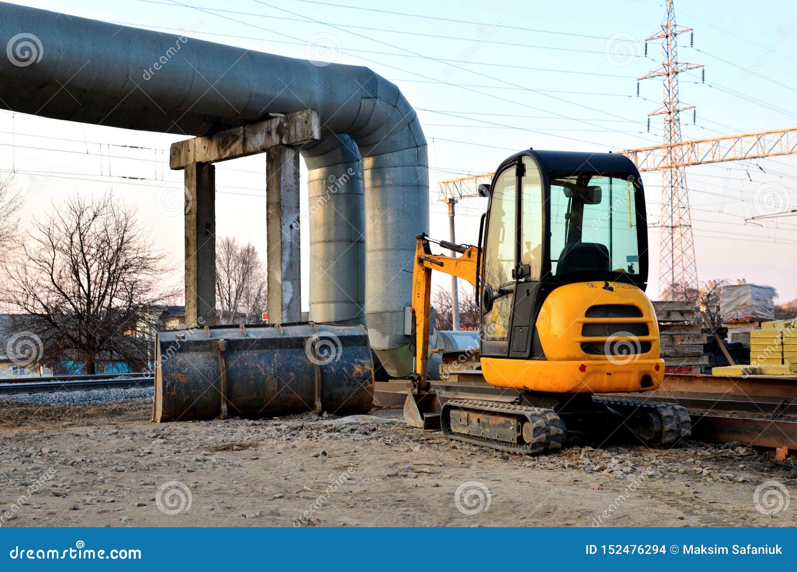 Mini Excavator on a Construction Site, Stock Photo - Image of business ...