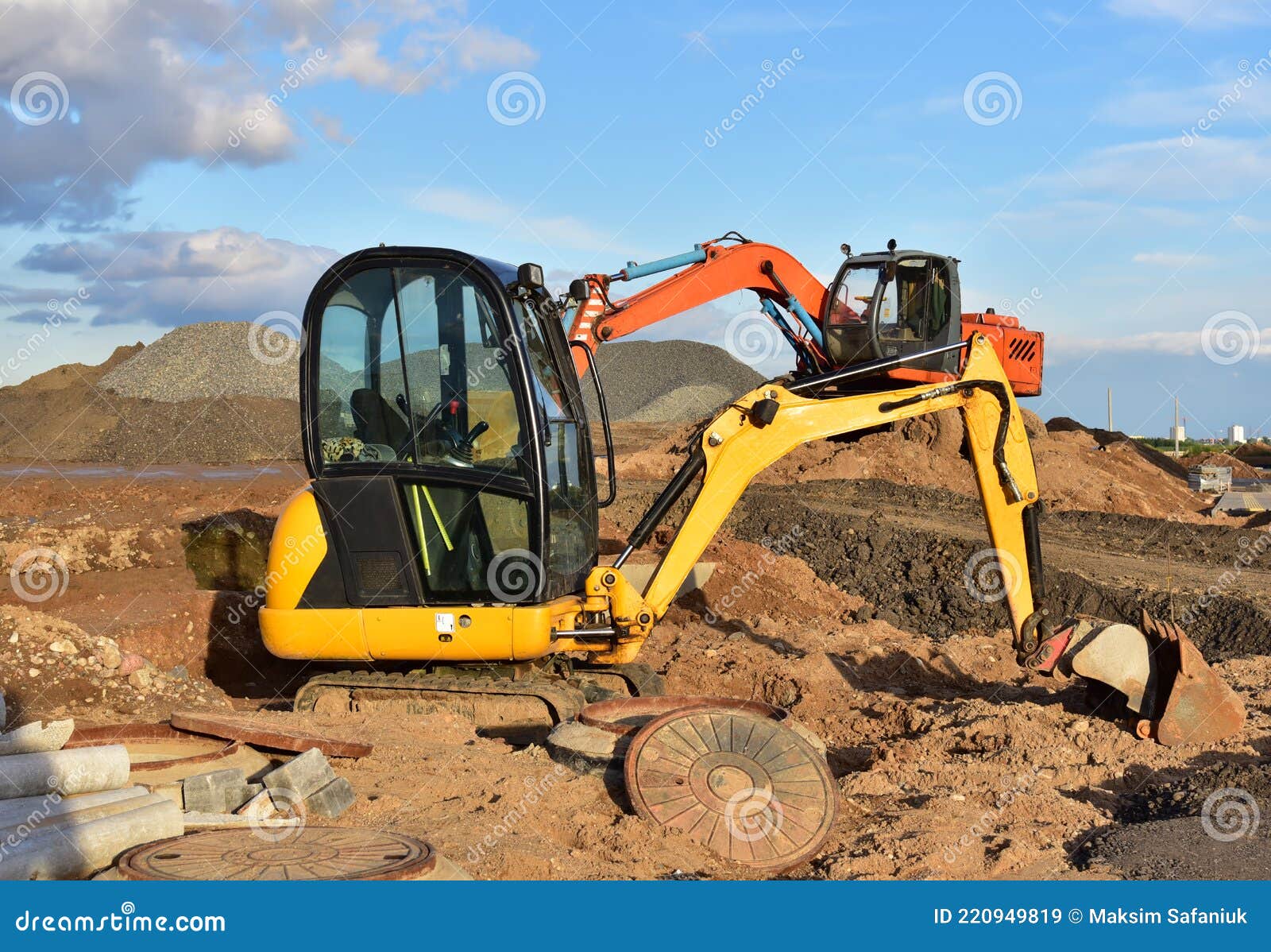 Mini Excavator during Earthmoving at Construction Site. Backhoe Dig ...