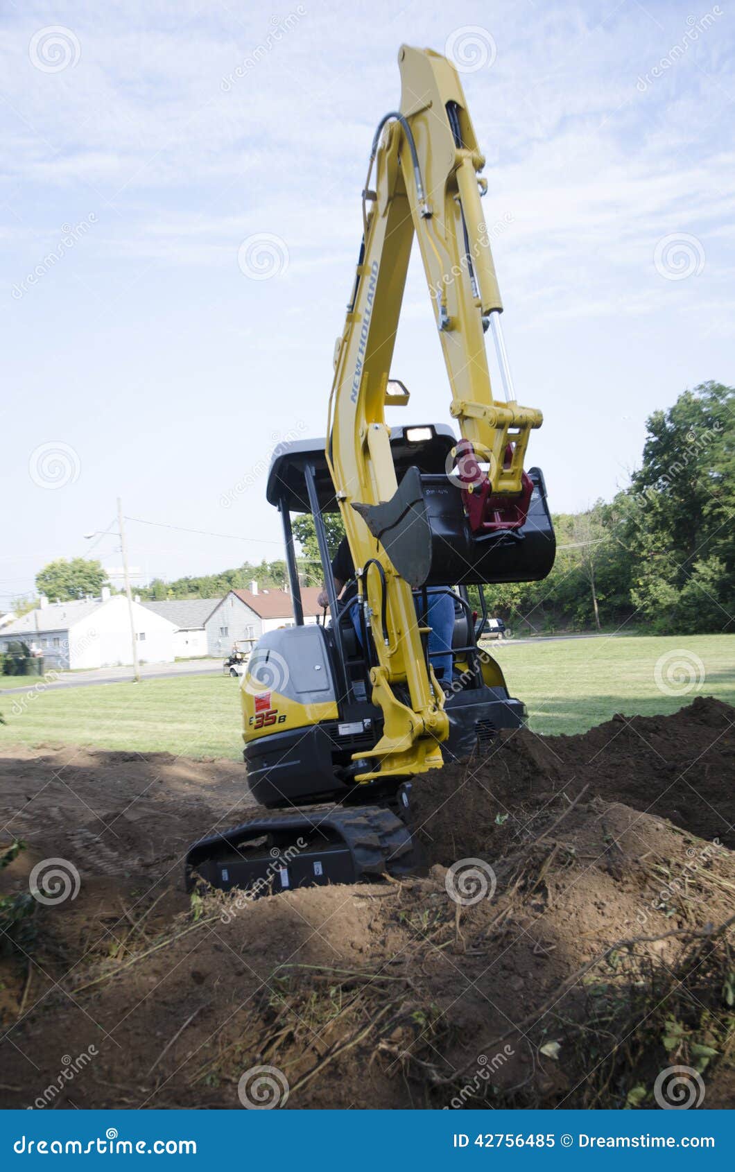 Mini Excavator Digging A Trench Among The Trees For Repairing City ...