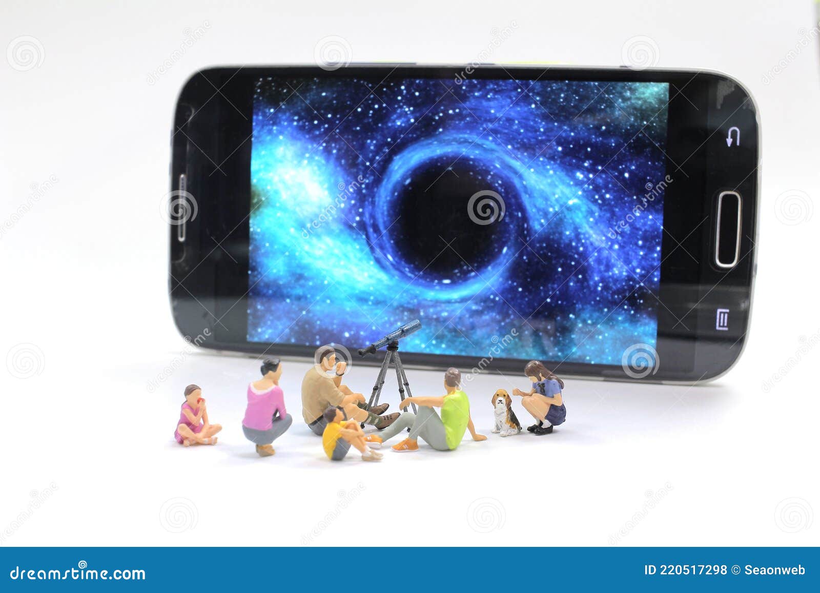 A Mini Figure of Astronomer with a Telescope Watching the Stars Stock ...