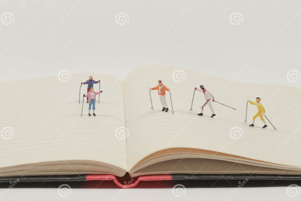 A Mini Figure of the Clip on the Book Stock Photo - Image of clip, book ...