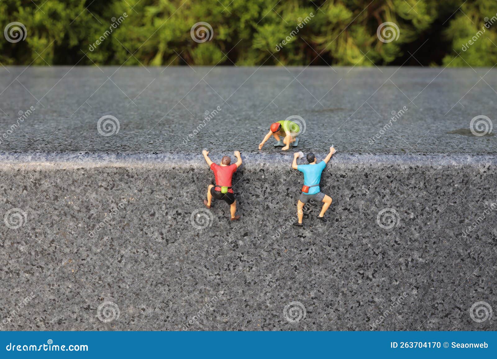 Miniature Figure Figure Hikers Climbing on Mountain Stock Photo - Image ...