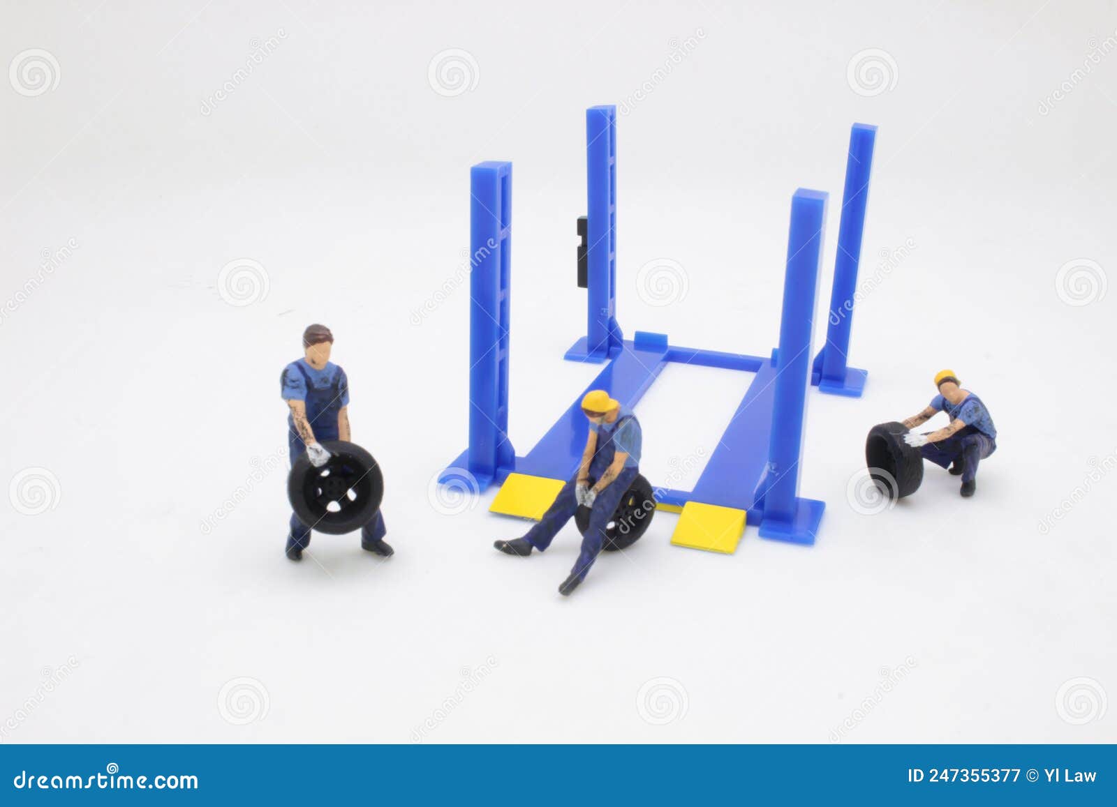 A Mini Figure Mechanics Working on Car Engine Stock Image - Image of ...