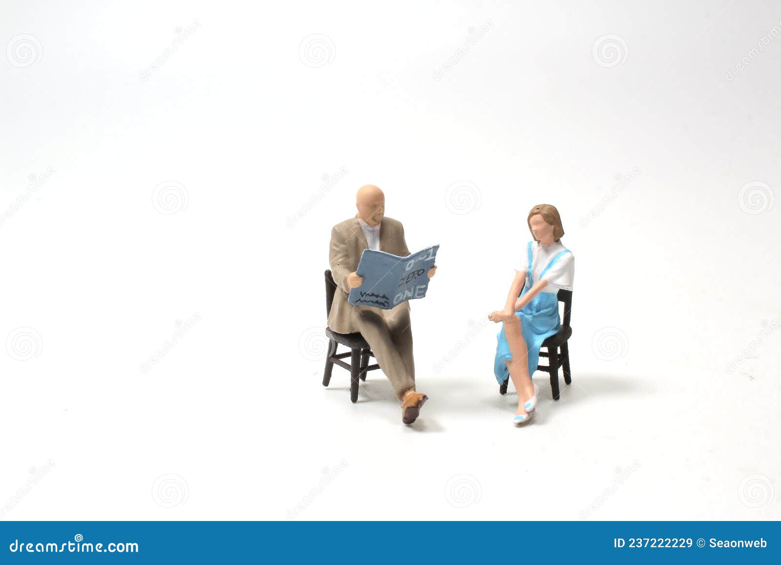 A Mini Figure People Sit on the Chair Stock Image - Image of concept ...