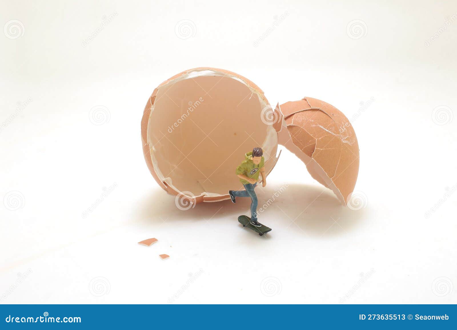 A Mini Figure Play the Skateboard Out of Egg Shell Stock Image - Image ... A Mini Figure Play the Skateboard Out of Egg Shell Stock Image - Image ...