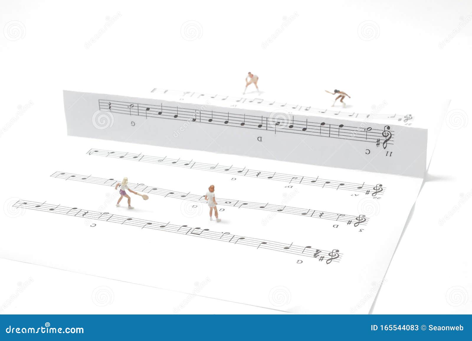 A Mini Figure Play the Tennis on the Music Notes Stock Image - Image of ...