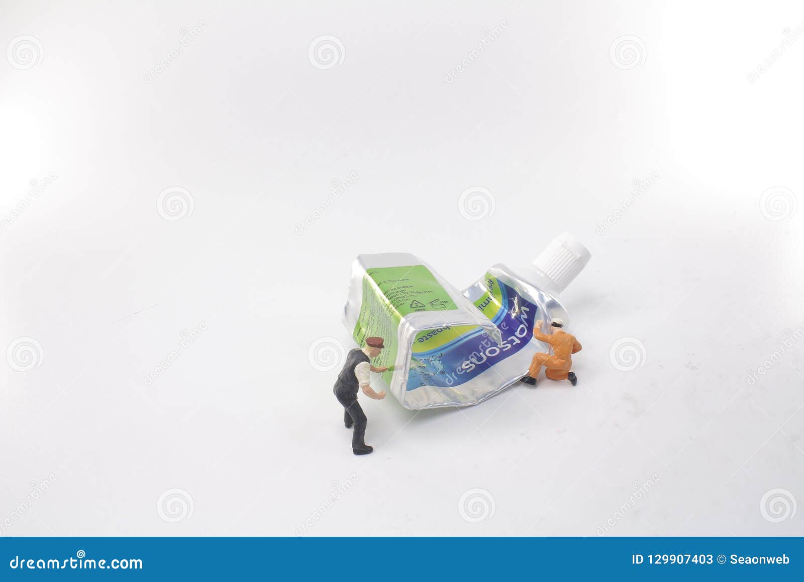 Mini Figure Push a Tubes of Toothpaste Stock Image - Image of cosmetic ...
