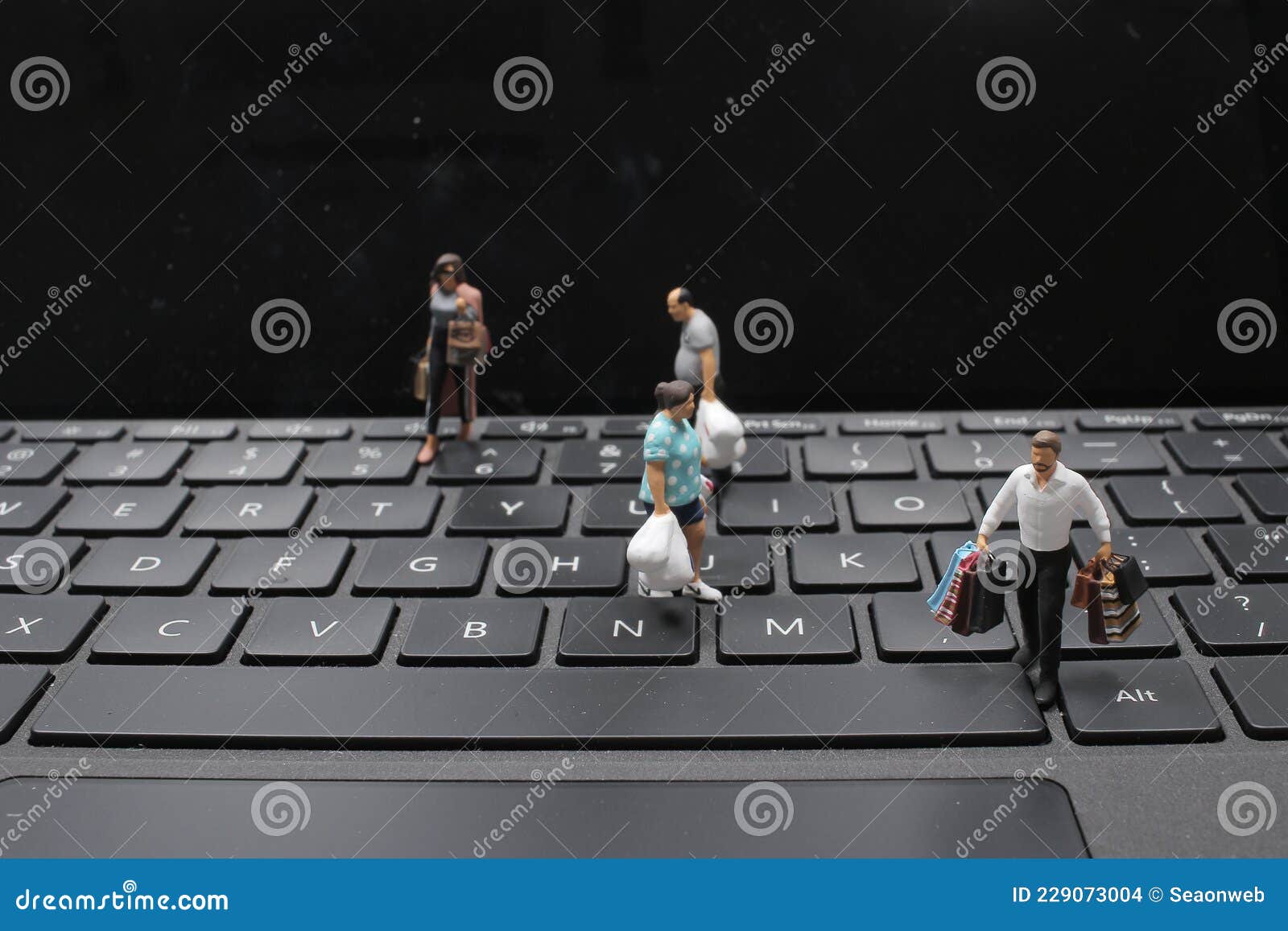 The Mini of Figure Shopping Online by Laptop Stock Photo - Image of ...