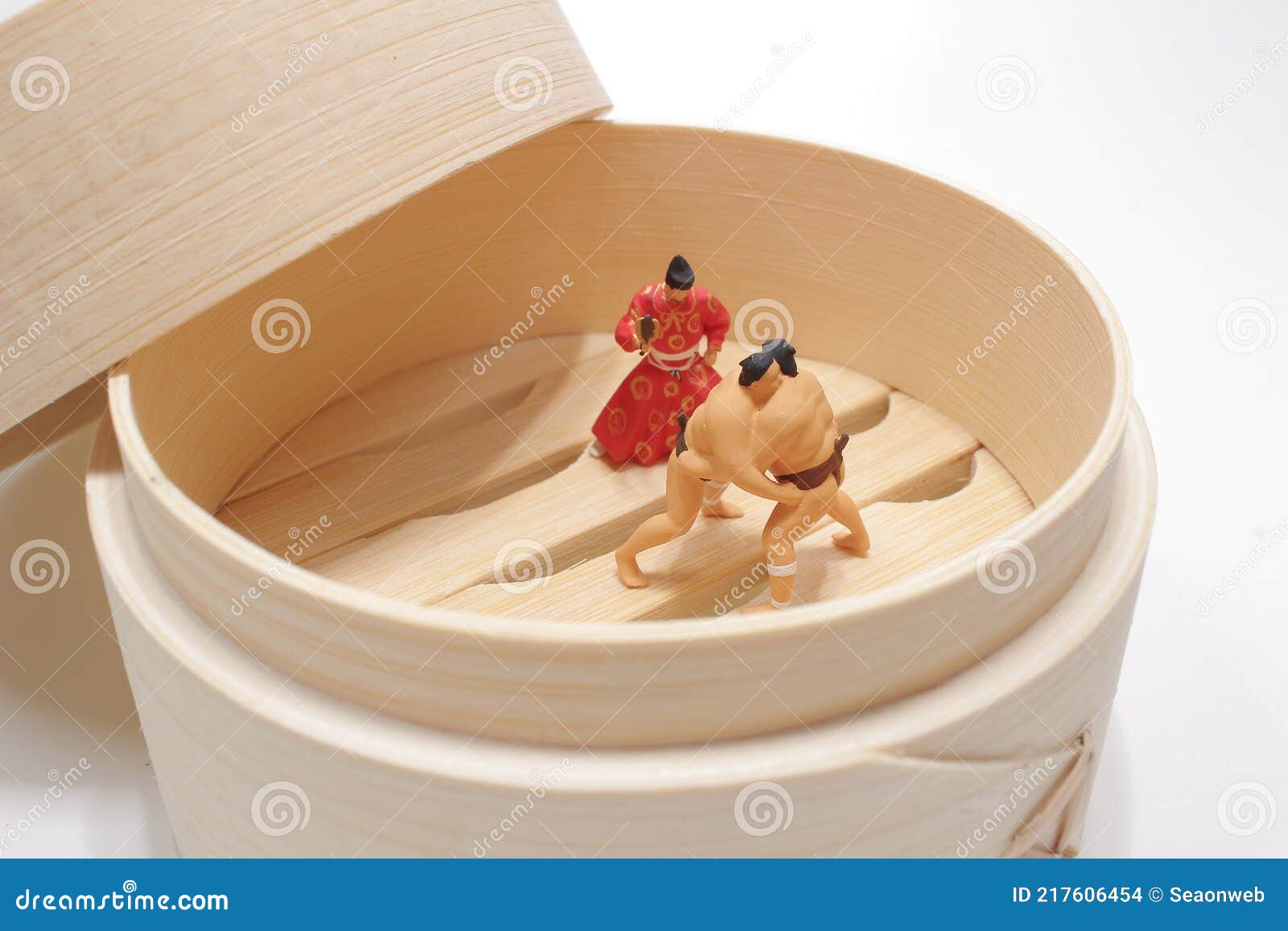A Mini Figure Sumo Fight at Steamer Stock Photo - Image of tournament ...